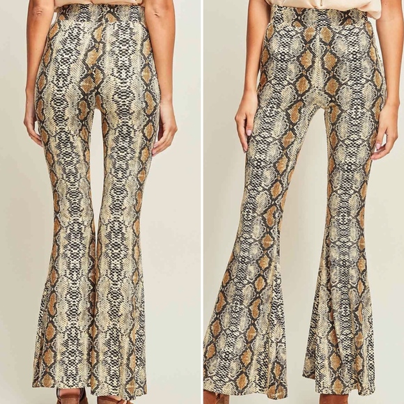 entro | Pants & Jumpsuits | New Arrivalreptile Print Flared Pants ...